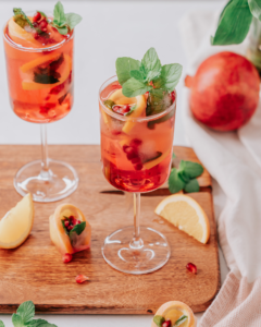 Spiced Pomegranate Rosé Spritzer - The Social Sipper