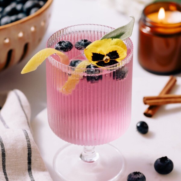 Spiced Blueberry French 75 - The Social Sipper