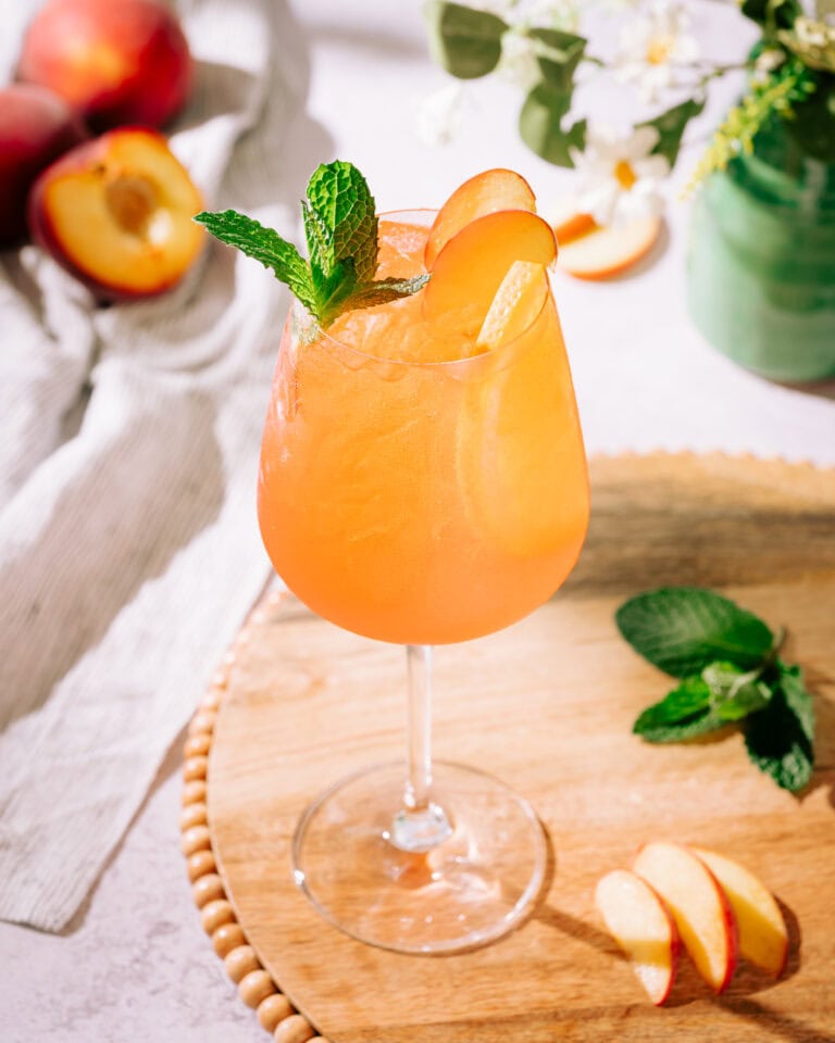 Aperol + Peach Spritz (Easy 4 Ingredient Recipe) - The Social Sipper