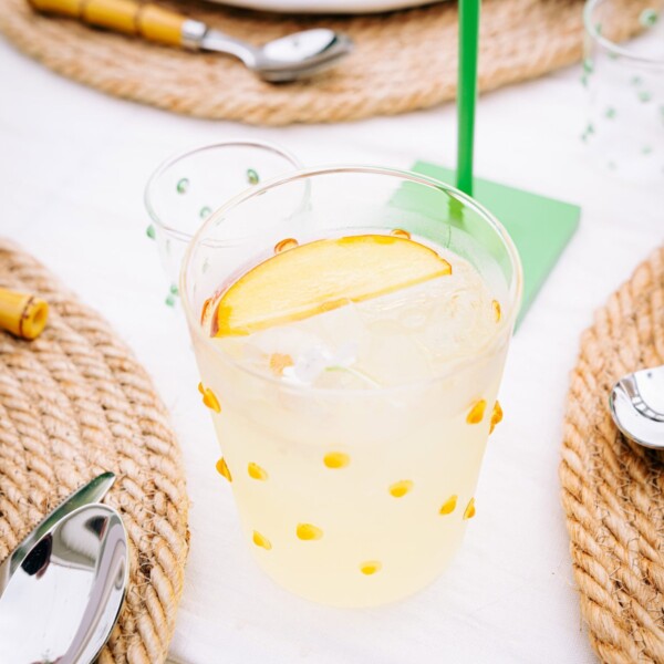 Simple Batch Peach and Lychee Cocktail Recipe - The Social Sipper
